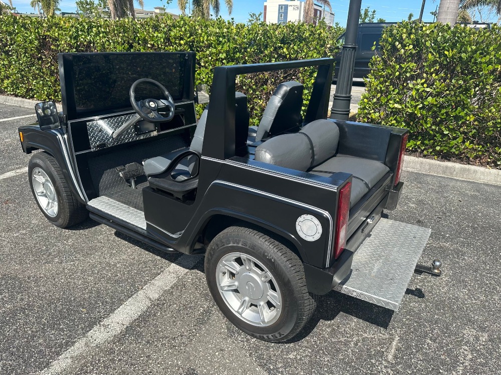 Lot M23-095 - 2009 ACG Hummer H3 Golf Cart | Premier Auction Group