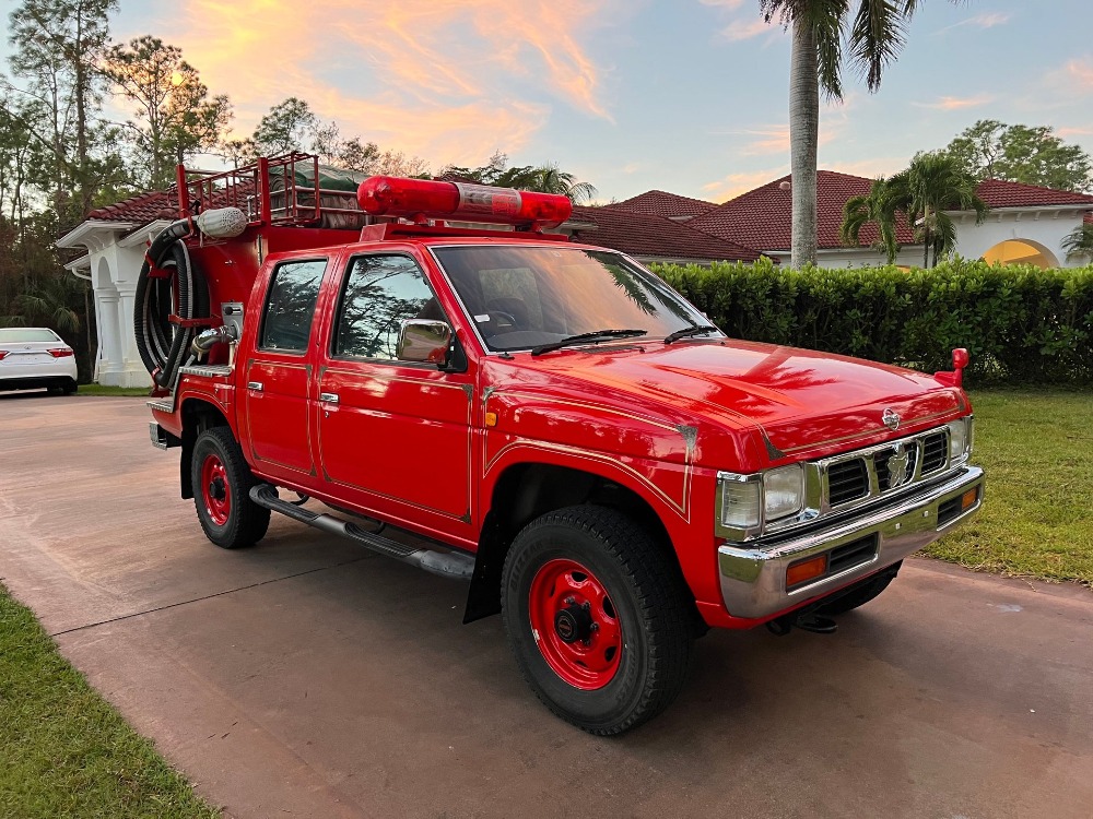 Lot D22-563 - 1995 Nissan D21 4 X 4 Firetruck | Premier Auction Group