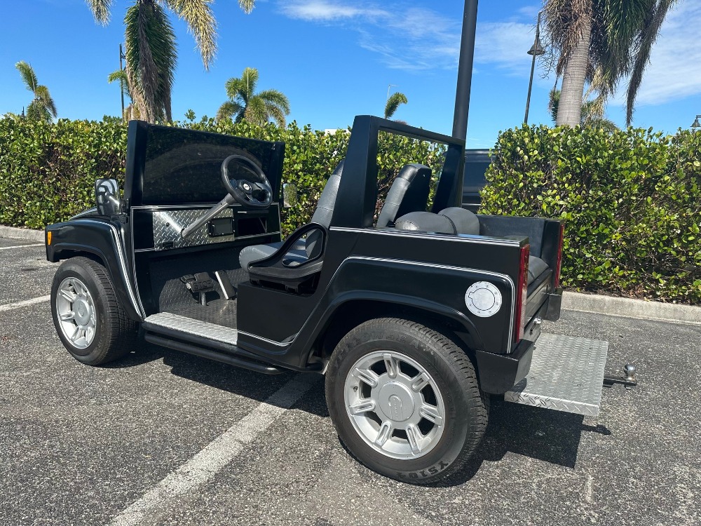Lot M23-095 - 2009 ACG Hummer H3 Golf Cart | Premier Auction Group