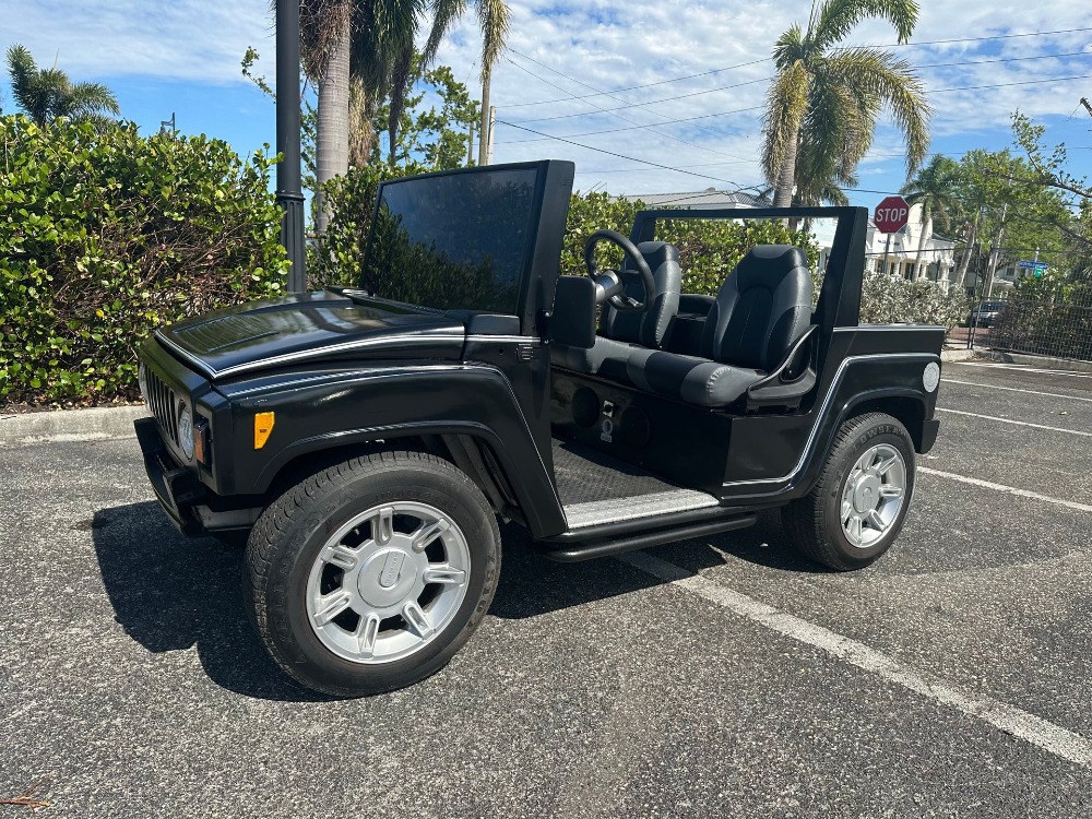 Lot M23-095 - 2009 ACG Hummer H3 Golf Cart | Premier Auction Group