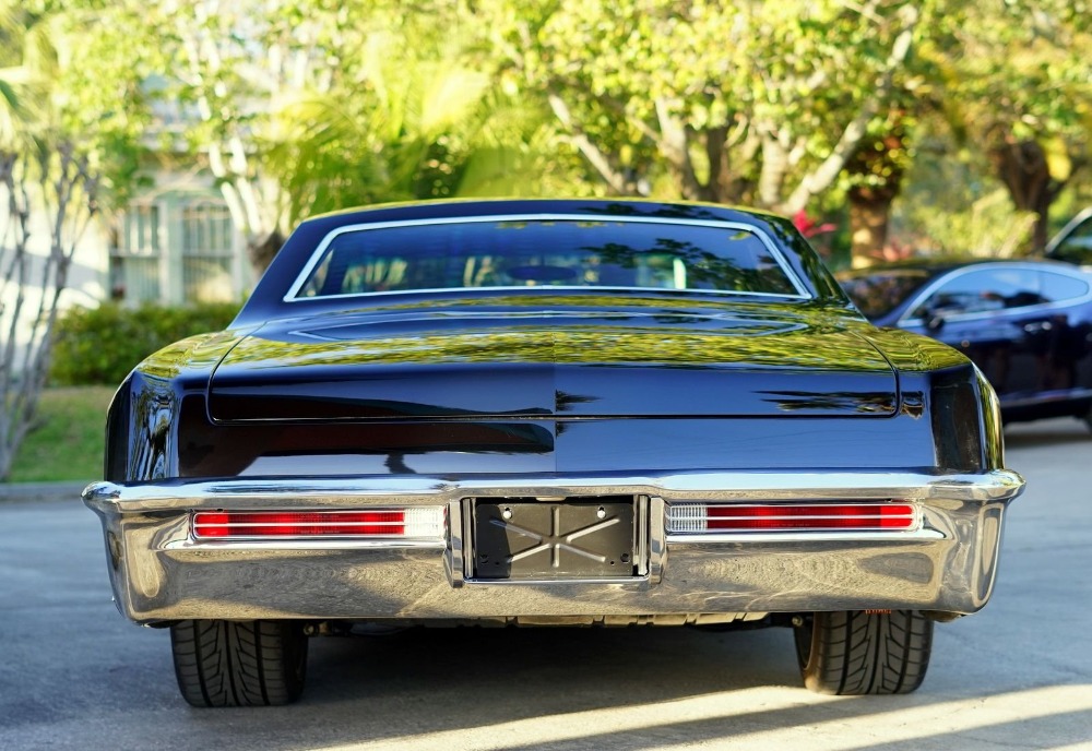 Lot M22-475 - 1965 Buick Riviera Restomod | Premier Auction Group