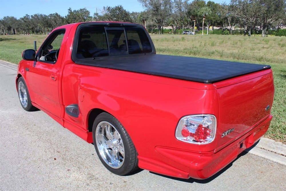 Lot M24-489 - 2002 Ford F150 SVT Lightning Pickup | Premier Auction Group