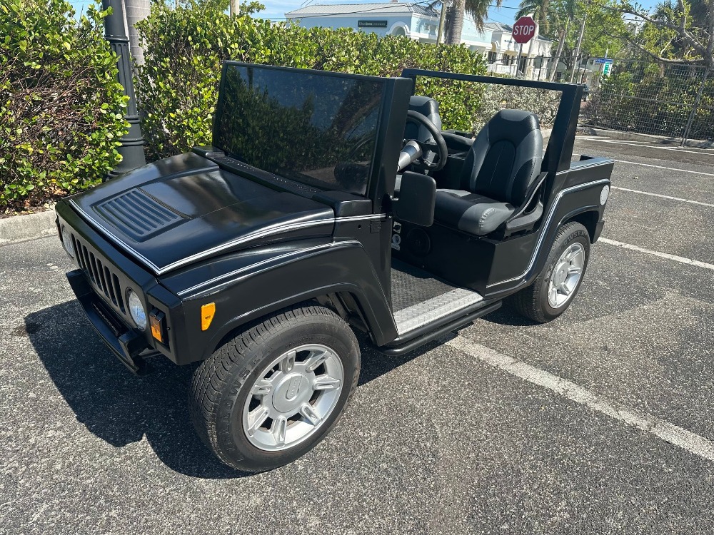 Lot M23-095 - 2009 ACG Hummer H3 Golf Cart | Premier Auction Group